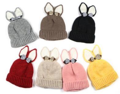 China New autumn and winter children's wool hat bow knitted rabbit ears warm knit hat thickening and velvet for sale