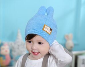 China winter children's hat baby eaves hat heart-shaped patch double-ear baby knitted hat manufacturers wholesale for sale