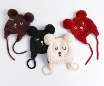 China Bear tied rope wool cap Korean handmade hat children winter warm earmuffs baby knitted hat for sale