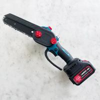 China Mini Chainsaw Cordless 6 Inch Switch Security Lock Handheld Small Chainsaw for sale