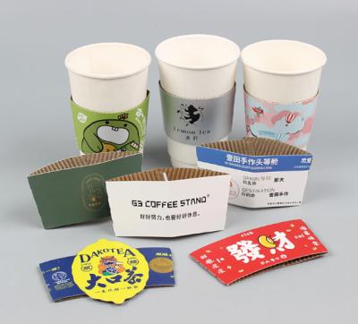China 2mm Disposable Custom Coffee Cup Sleeves Corrugated Paper Heat Insulation Biodegradable for sale