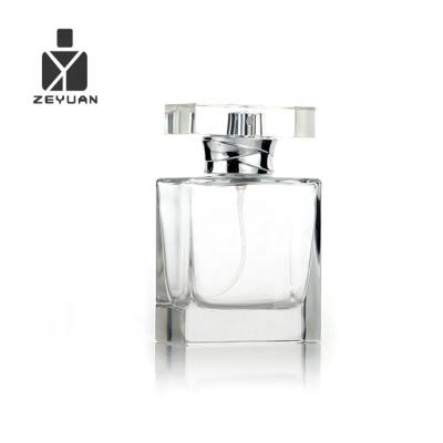 China Luxury 50ml Square Polished Crimp Neck Glass Empty Perfume Bottle With Surlyn Cap for sale