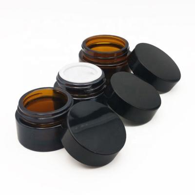 China 10g 30g 50g 100g 200g Amber Glass Cream Jar Classic Cream Jar With Black Lid for sale