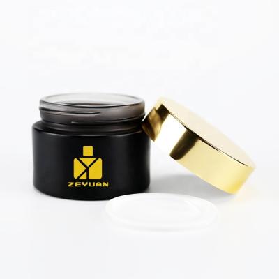 China Wholesale Empty Packaging 15g 30g 50g Matte Black Cream Personal Care Jar With Gold Cap And Hot Press for sale