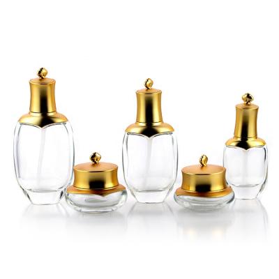 China Personal Care 30ml 40ml 50ml 100ml 120ml In Stock Ready To Ship Luxury Gold Cosmetic Bottles Empty Lid Bottle With Pump For Lotion Serum for sale