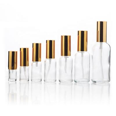 China Personal Care 5ml 10ml 15ml 20ml 30ml 50ml 100ml Empty Glass Spray Refil Bottles Clear Glass Spray Bottle With Gold Fine Mist Sprayers for sale