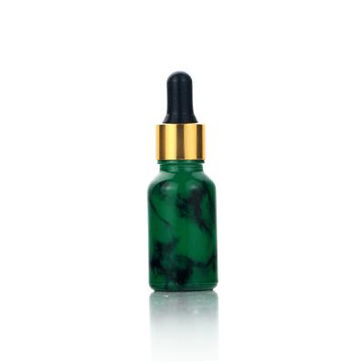 China Essential Oil Bottle With Agate Green Customized Unique Dropper Bottle 15ML Marble Coating Bottle Glass for sale