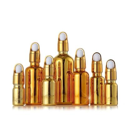 China 10ml 15ml 20ml 30ml 50ml 100ml luxury high quality gold plated essence glass liquid dropper bottle for sale