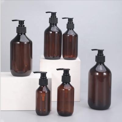 China Classic 16 oz 240ml 500ml Amber Lotion Soap Dispenser Refillable Container Boston Round Press Glass Pump Bottle for sale
