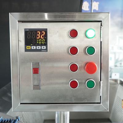 Cina 65KW Macchina per la frittura automatica del pesce 150L 380V riscaldamento elettrico in vendita