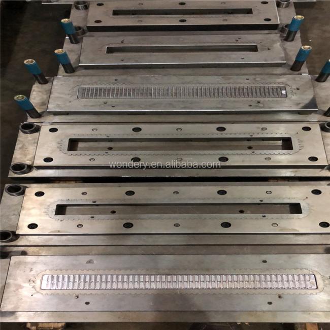 Side view of radiator header plate die