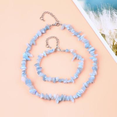 Cina Fabbricazione a mano Scheletri regolabili Bracciale di pietra di ghiaia Collare Set di cristalli irregolari Gioielli di energia curativa in vendita
