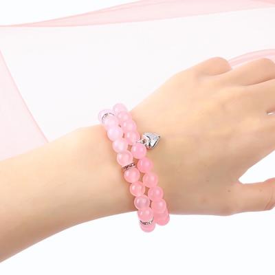 Cina 8mm Rose Quartz Gemstone Bead Bracelet Energia di guarigione Gioielli in vendita