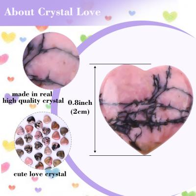 Cina Cristalli in forma di cuore di rhodonite vetrata per il bilanciamento del chakra in vendita