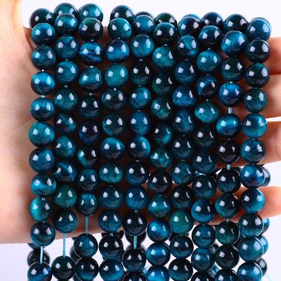 Cina 8mm Lago Occhio di Tigre Blu Gemstone di cristallo di pietra di guarigione per la produzione di gioielli in vendita
