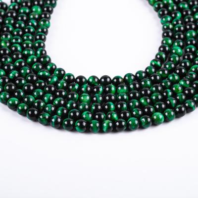 Cina 8mm Occhio di tigre verde Gemstone di cristallo di pietra di guarigione per la produzione di gioielli in vendita