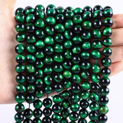 Cina 8mm Occhio di tigre verde Gemstone di cristallo di pietra di guarigione per la produzione di gioielli in vendita