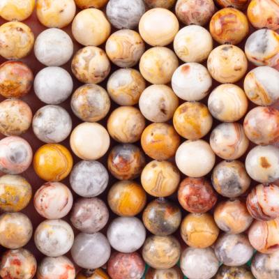 Chine 8 mm de pierre rouge de réseau pierre précieuse de guérison de pierre de cristal perles pour la fabrication de bijoux à vendre