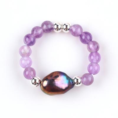 China 4mm Handmade Gemstone Beaded Ring Adjustable Elastic Sodalite Stone Ring With Peal Charm For Party Daily Wearing for sale