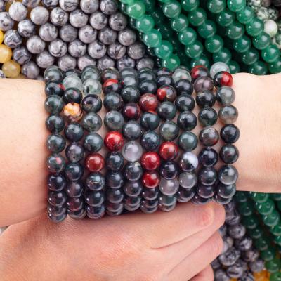 Cina 8mm di pietra di sangue africana, gemma di cristallo curativa, perle di pietra per la produzione di gioielli. in vendita