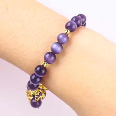 Cina 8mm cristallino viola cat eye bead lucidato gemstone braccialetti stretch in vendita