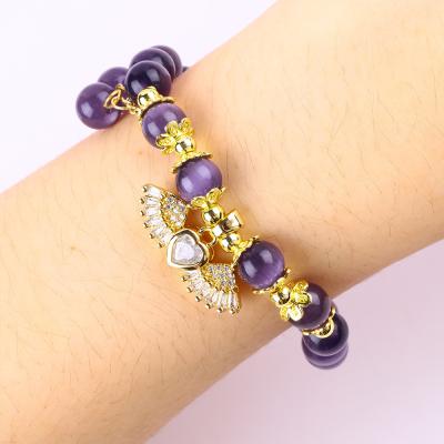 Cina 8mm cristallino viola cat eye bead lucidato gemstone braccialetti stretch in vendita