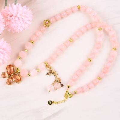 Cina Il fascino della farfalla rosa quarzo pietra cristallo maglione collana guarigione emotiva in vendita