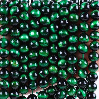 Cina 8mm Occhio di tigre verde Gemstone di cristallo di pietra di guarigione per la produzione di gioielli in vendita