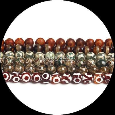 China Formas redondas de contas de ágata tibetana Filamentos de contas soltos para fabricação de jóias DIY à venda