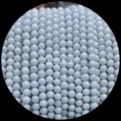 Cina Pietra preziosa di forma rotonda Howlite Rohdonite Pietra cristallina Diversi tipi di pietra di guarigione per gioielli fai da te in vendita