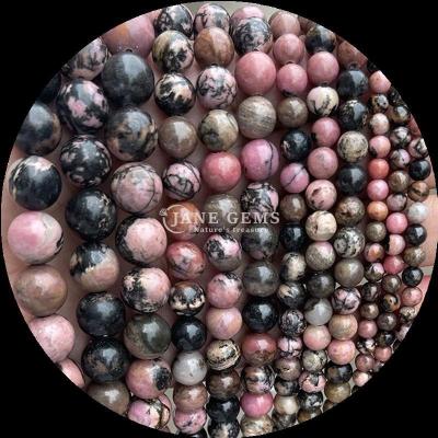 Cina Pietra preziosa di forma rotonda Howlite Rohdonite Pietra cristallina Diversi tipi di pietra di guarigione per gioielli fai da te in vendita