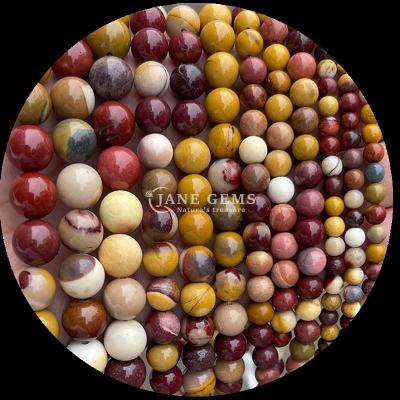 Cina Pietra preziosa di forma rotonda Howlite Rohdonite Pietra cristallina Diversi tipi di pietra di guarigione per gioielli fai da te in vendita