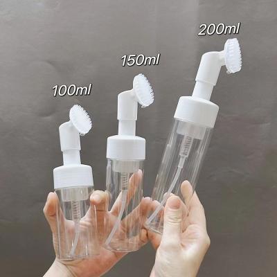 China 100ml 200ml Cosmetic Silicone Brush Foam Pump Bottle Reusable Plastic Dispenser for Facial Cleanser Soap Pump Dispenser for sale