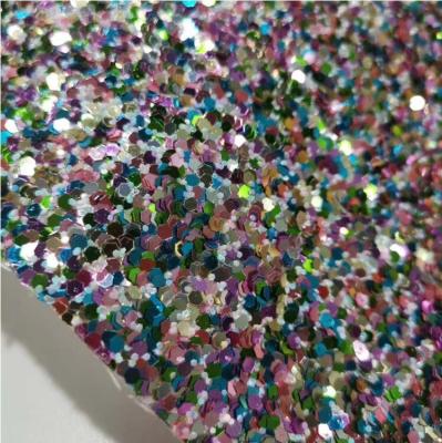 China Super Shining Laser Glitter Pvc Mirror Leather Patent PU Artificial Leather for Hair Pin Decoration Bag Shoe for sale