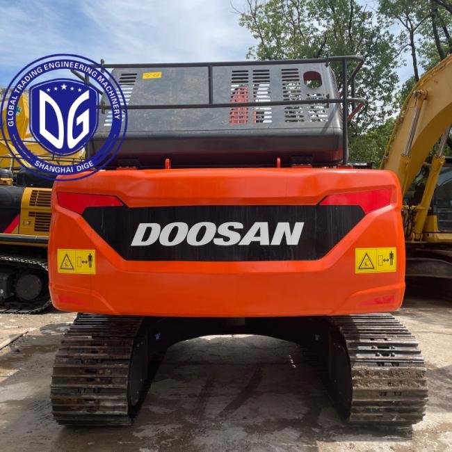 Doosan DX225 excavator working on construction site