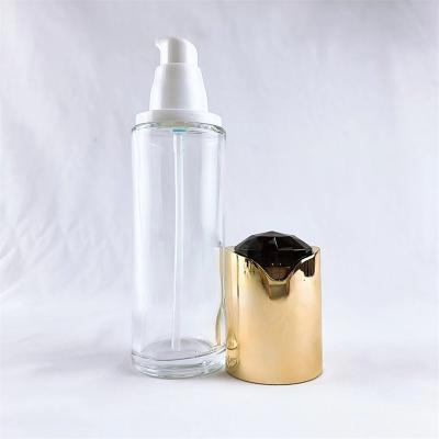 Cina Empty Frosted Lotion Glass Pump Bottle with Golden Pump in vendita