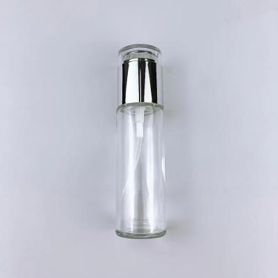 Cina Lotion Bottles for Lotion Body Wash Shampoo Conditioner transparent glass cosmetic bottle with sprinkler in vendita