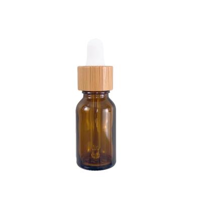 China Matte frosted white round 30ml glass dropper bottle with bamboo wood lids cap for sale