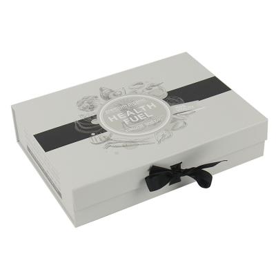 China Luxury Storage Custom Printed Hard Paper Gift Magnetic Lid Box with Ribbon Free Design for sale