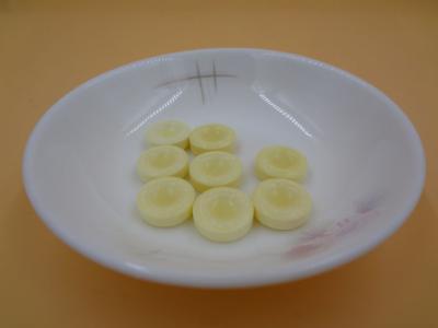 China Round Ring Roll Handmade Milk Tablet Candy 7g Alumimum Paper Packed for sale