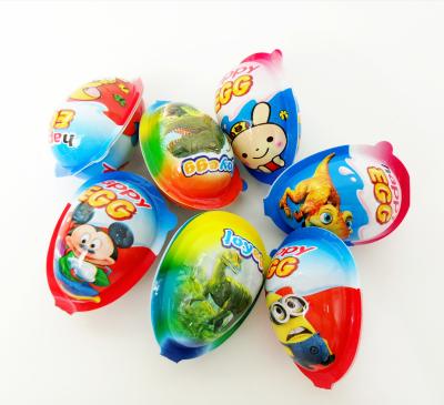 Cina Il multi sapore Candy della frutta di Toy Egg Candy Happy Egg gelatinizza il fagiolo con la caramella adorabile di Mini Spinner Toy in vendita