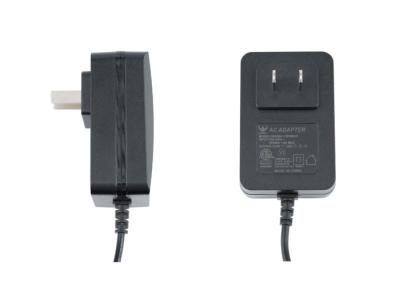 China 24W Black Interchangeable Plug Power Adapter 5V Output Voltage AU EU US UK Version. for sale