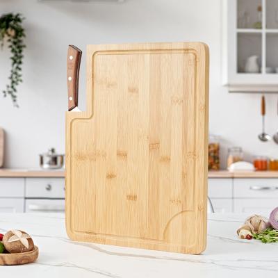 Cina Grande macellaio di bambù organico extra Block Cutting Board con il supporto e la scanalatura del coltello in vendita
