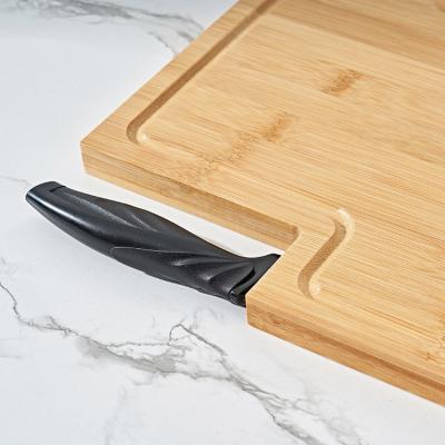 Cina Grande macellaio di bambù organico extra Block Cutting Board con il supporto e la scanalatura del coltello in vendita