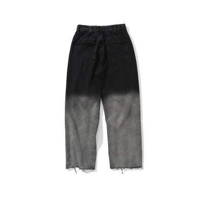 Cina I jeans strappati il nero della via principale dell'OEM adattano all'usura degli uomini i pantaloni casuali sciolti diritti in vendita