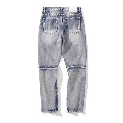 Cina L'OEM ha lavato i pantaloni spaccati diritti unisex strappati blu dei jeans con i graffiti in vendita