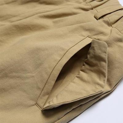 Cina OEM maufactory  Summer men's solid color front bag shorts  loose straight tube work pants in vendita