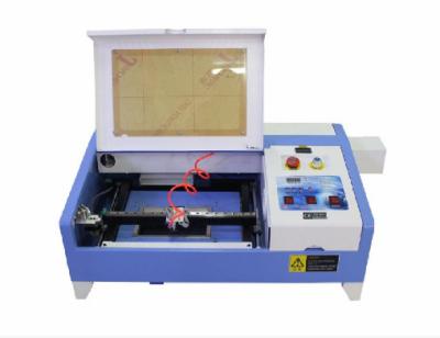 China High Grade DSP Cotnrol LCD Screen 128m Memory 40W 300X200mm Working Table CO2 Laser Engraver for sale