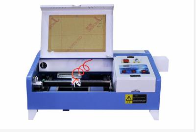 China Paper Wood Plastic Rubber Engraving DSP Offline Type Ruida Moth3020 40-50watt CO2 Laser Engraving Machine for sale