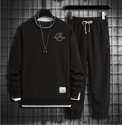 中国 2023ばねおよび秋のパーカーは人のワッフルのcrewneckのパーカーのズボンを置いた 販売のため
